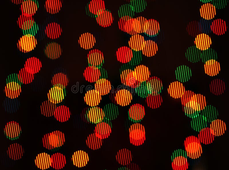 A Light Bokeh Pattern of Geometric Elements on a Dark Background Stock ...