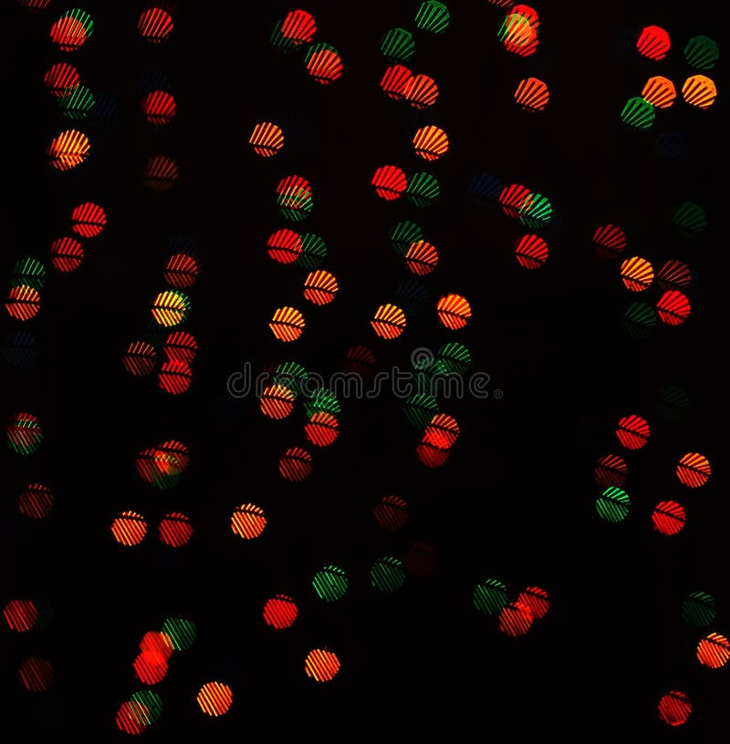 A Light Bokeh Pattern of Geometric Elements on a Dark Background Stock ...