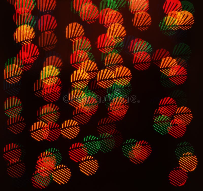 A Light Bokeh Pattern of Geometric Elements on a Dark Background Stock ...