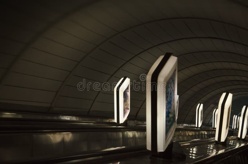 Light Boxes Along the Tunnel. Descent in the Metro Stock Photo - Image ...