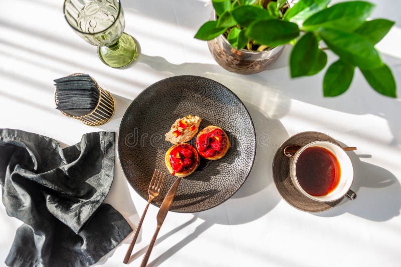 Light Breakfast in a Restaurant with Coffee and Pancakes with Cherry ...