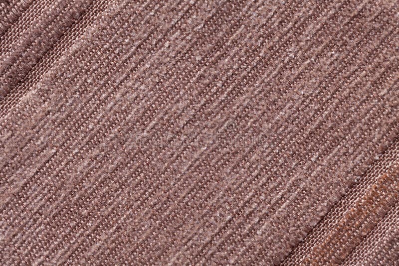 Light Brown Background of a Knitted Textile Material. Fabric with a ...
