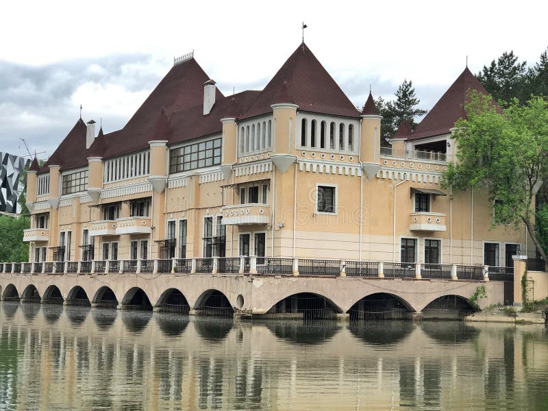 A Light Brown Building Near the Water Stock Image - Image of house ...