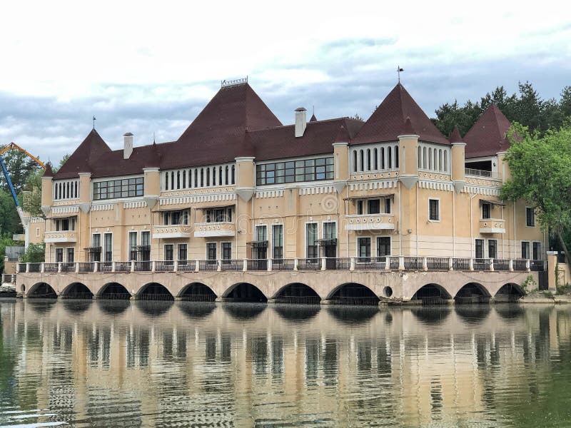 A Light Brown Building Near the Water Stock Photo - Image of ...
