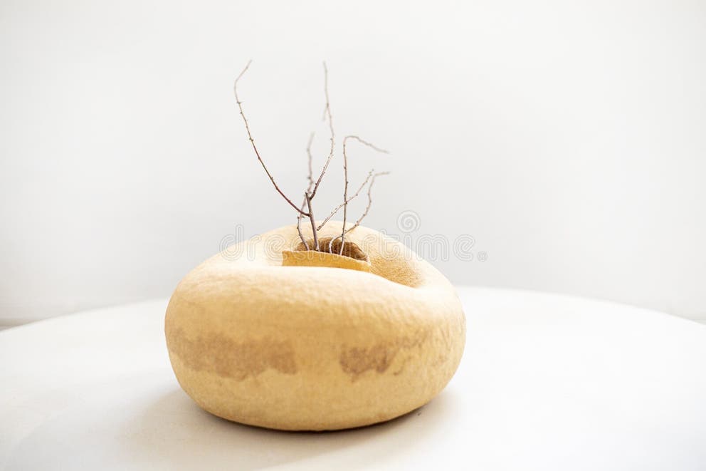 Light Brown Clay Vase with Twigs on the Table in a Interior Stock Photo ...