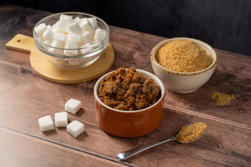 Light Brown, Dark Brown and White Sugar Cubes in Bowls. Different Type ...