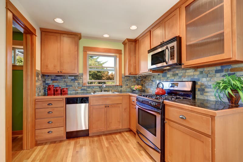Light Brown Kitchen Cabinetry and Brick Tile Back Splash Trim Stock ...