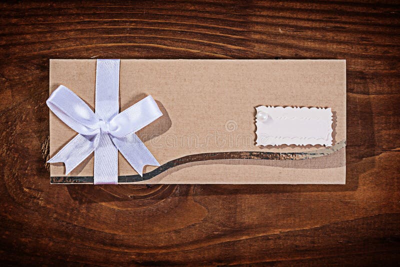 Light Brown Wedding Invitation Envelope on Old Wooden Board Stock Photo ...