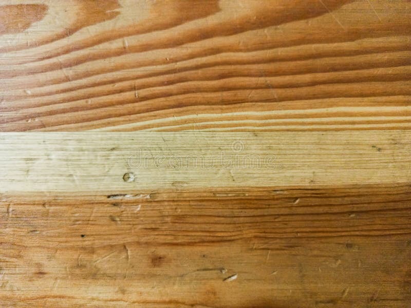 A Light Brown Wooden Surface with a Grainy Texture that Has Minor ...