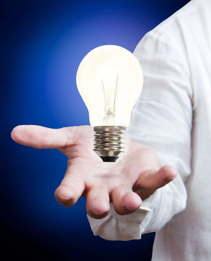Light bulb on hand stock photo. Image of light, power - 21979674