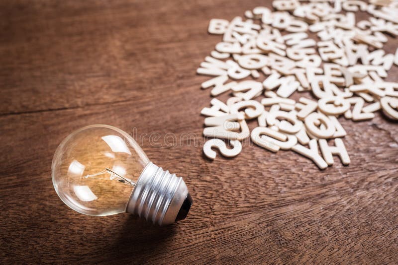 Light Bulb and Alphabets stock image. Image of inspiration - 137030987