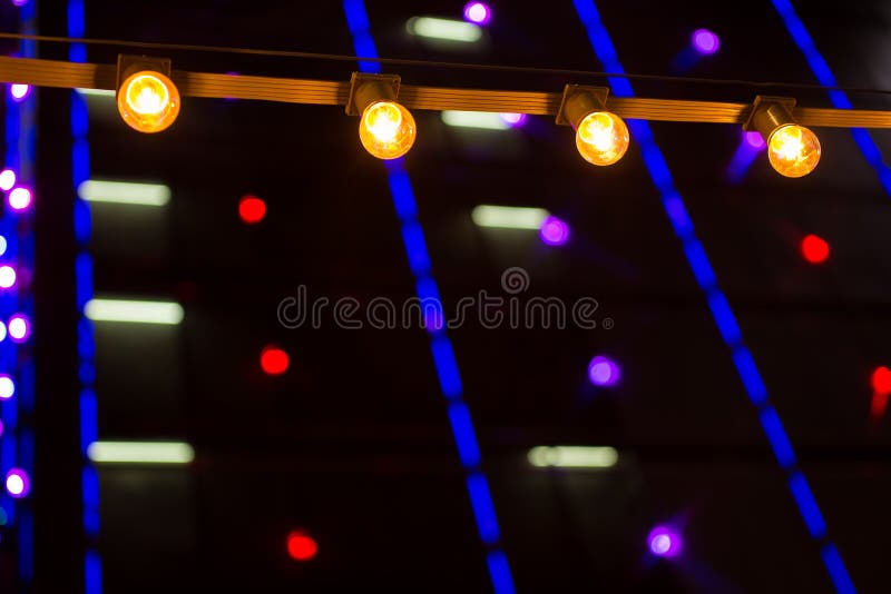 Light Bulb on Night Background Stock Photo - Image of glitter, blurred ...