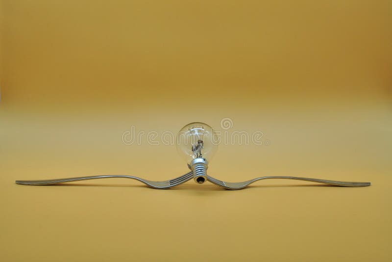 Light Bulb Balancing on a Composition of 2 Intertwined Forks Isolated ...