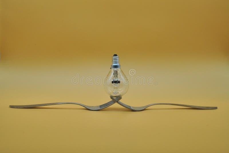 Light Bulb Balancing on a Composition of 2 Intertwined Forks Isolated ...