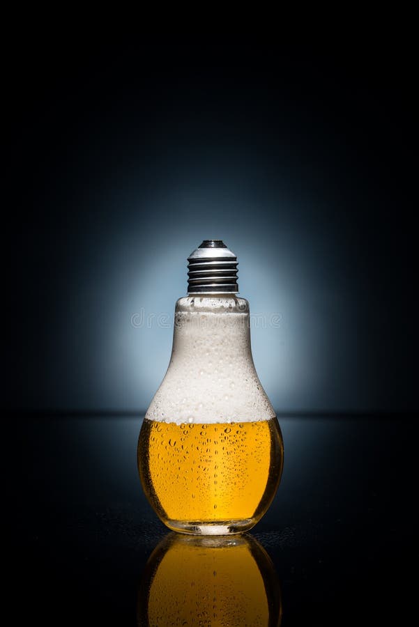 Light Bulb Beer with Drops and Ice Stock Image - Image of glass, full ...
