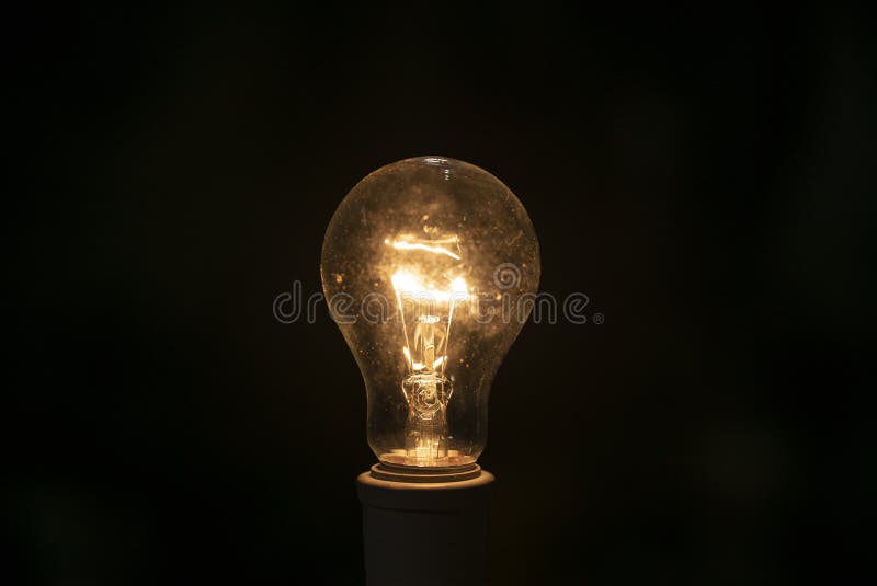 Light Bulb on Black Background Stock Photo - Image of electricity ...