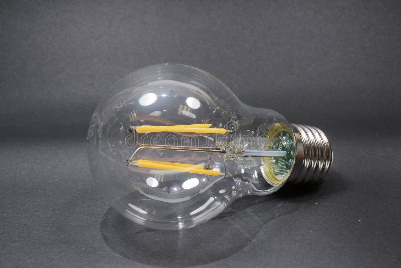 A Light Bulb at the Black Color Background Stock Photo - Image of ...
