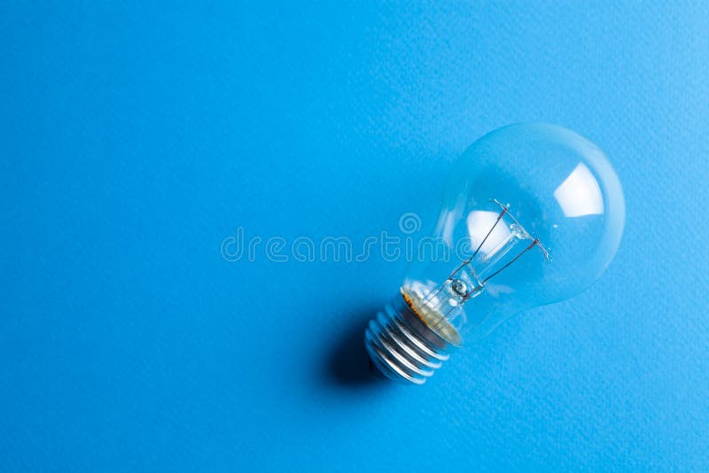 Light Bulb on Blue Background Stock Image - Image of blue, power: 239013561