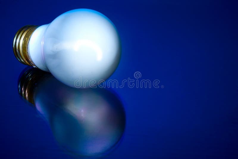 Light Bulb on Blue Background Stock Photo - Image of glass, bulb: 48871448