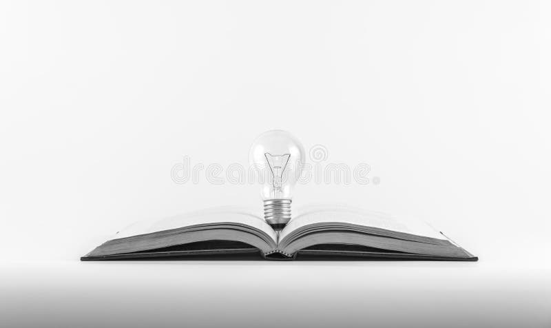 Light bulb on a book. stock image. Image of conceptual - 38806135