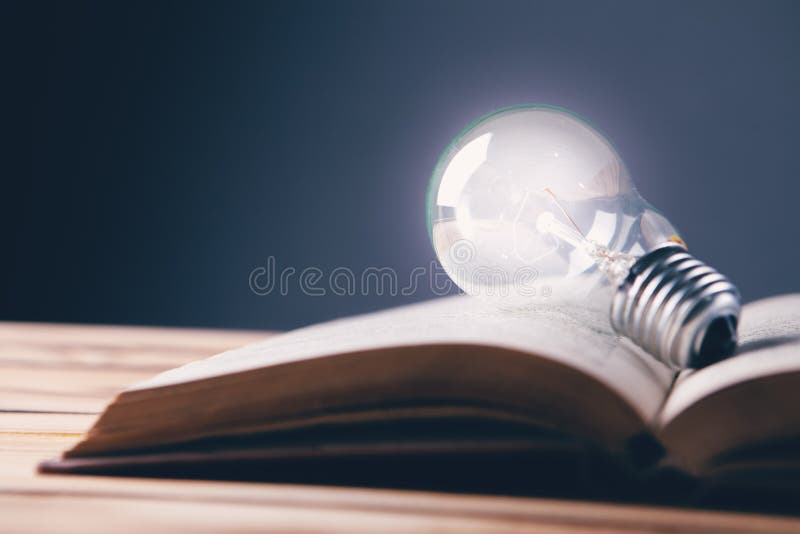 Light bulb and book stock image. Image of study, open - 234157261