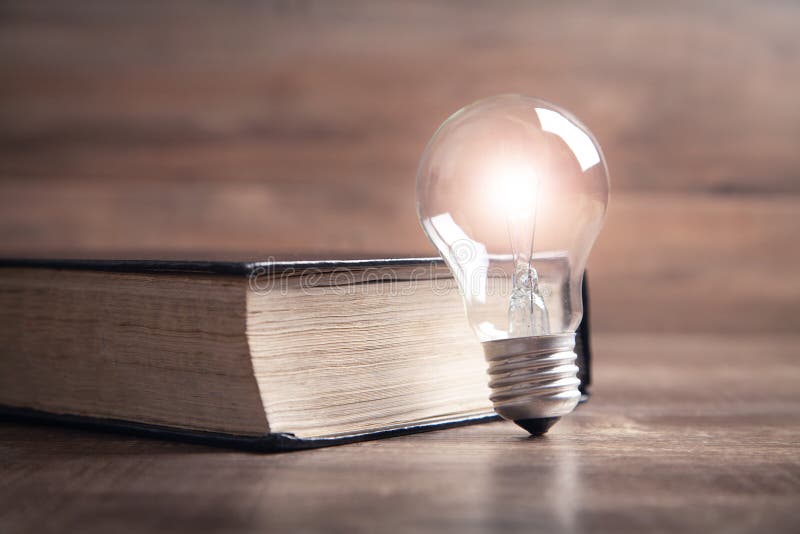Light Bulb and Book. Knowledge and Wisdom Stock Image - Image of ...