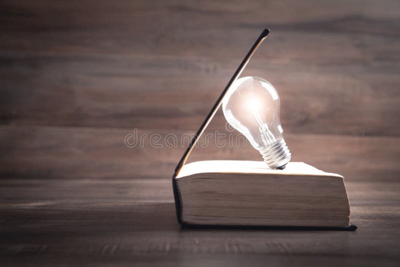 Light Bulb and Book. Knowledge and Wisdom Stock Photo - Image of school ...