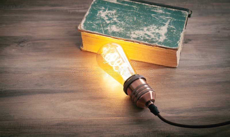Light Bulb and Book. Knowledge and Wisdom Stock Image - Image of page ...