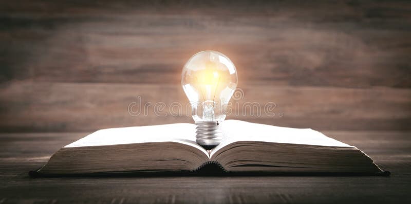 Light Bulb and Book. Knowledge and Wisdom Stock Photo - Image of holy ...
