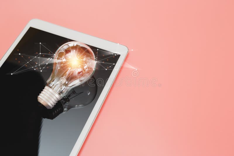 Light Bulb Bright Light Flare on Tablet. Think Creative Innovation. E ...