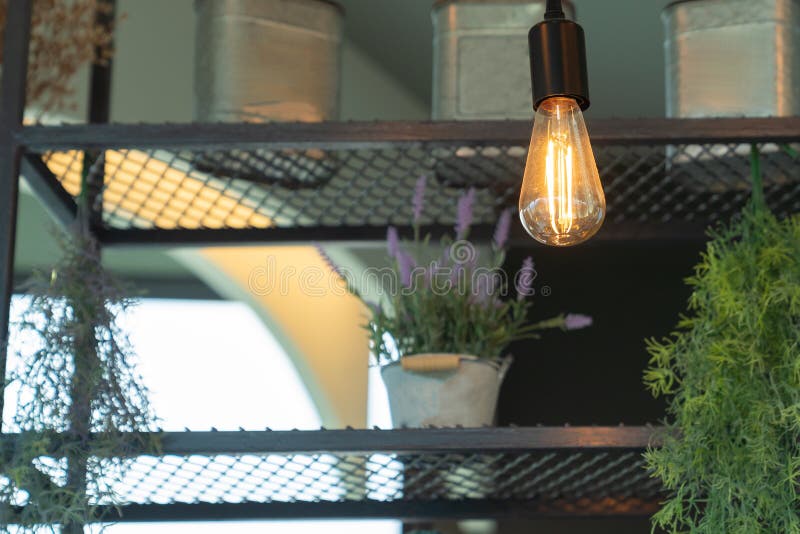 Light bulb in cafe stock image. Image of filament, glass - 191754095
