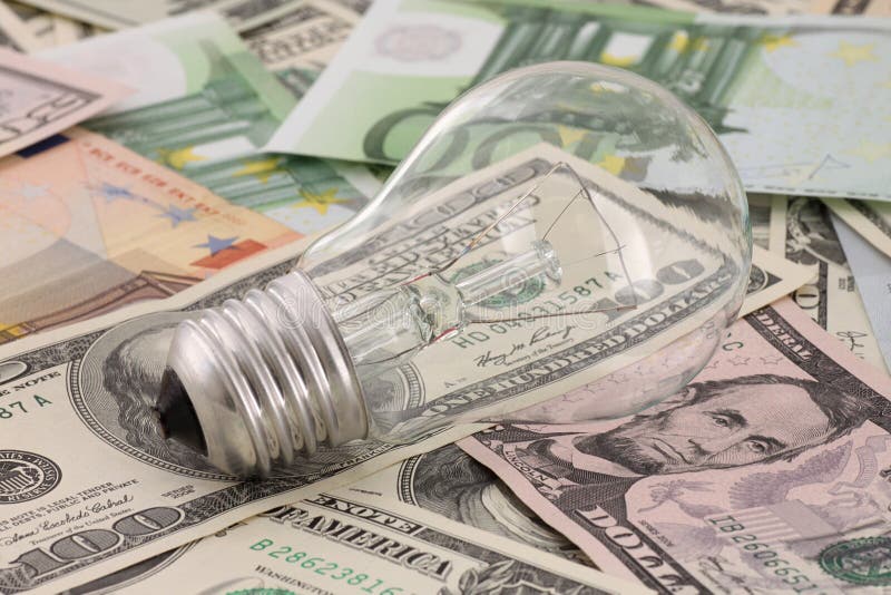 Light bulb on cash stock photo. Image of banknotes, innovation - 27360664