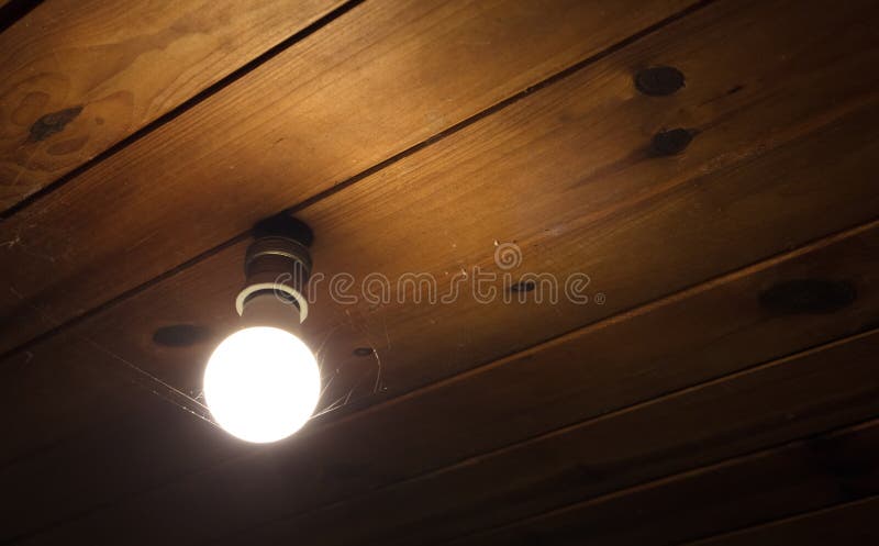 Light Bulb from the Ceiling Stock Photo - Image of background ...