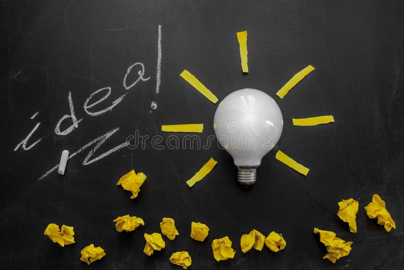 Light Bulb on Chalkboard with Title Idea! Written by Chalk Stock Image ...