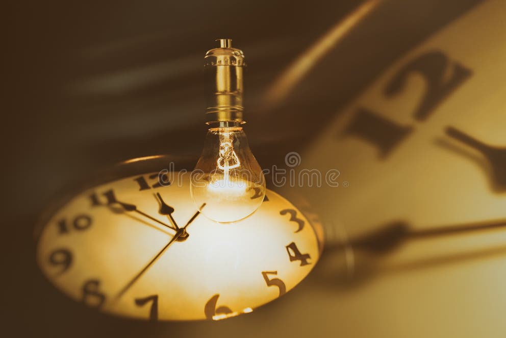 Light bulb and clock stock photo. Image of inspiration - 85996238