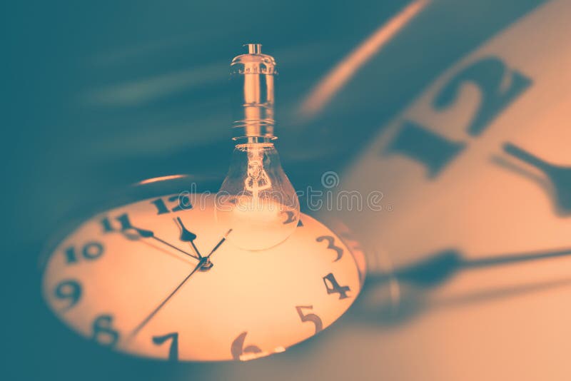 Light bulb and clock stock image. Image of business, glowing - 85996277