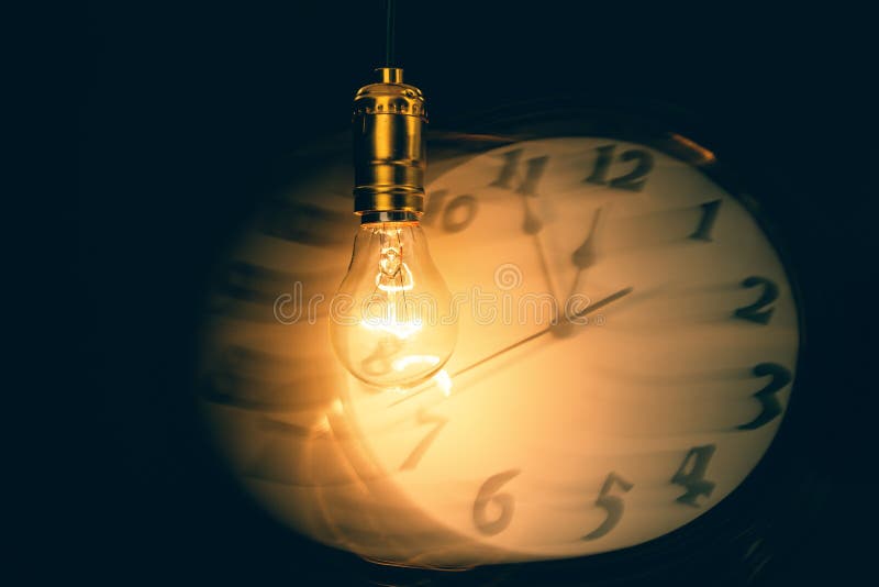 Light bulb and clock stock photo. Image of glowing, bulb - 86109138