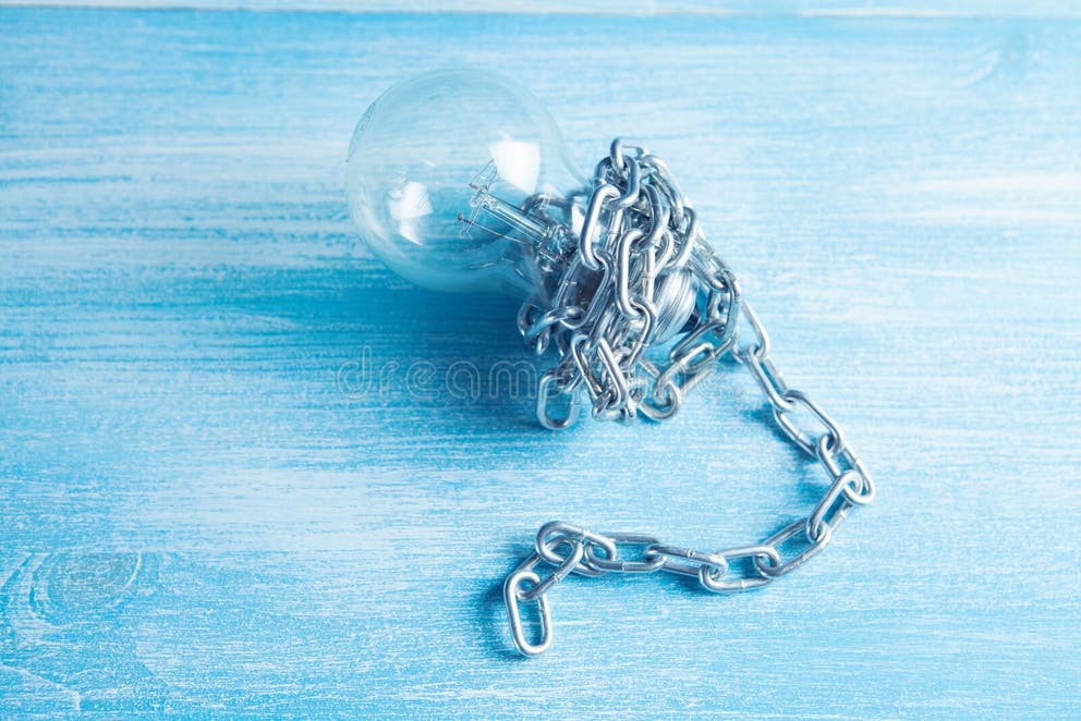Light Bulb Closed by a Chain Stock Photo - Image of technology ...