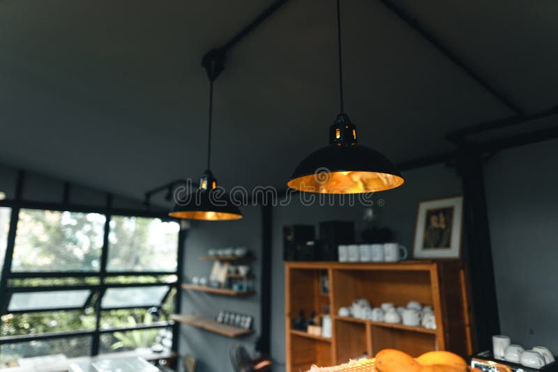 Light bulb in coffee shop stock photo. Image of decorative - 220914788