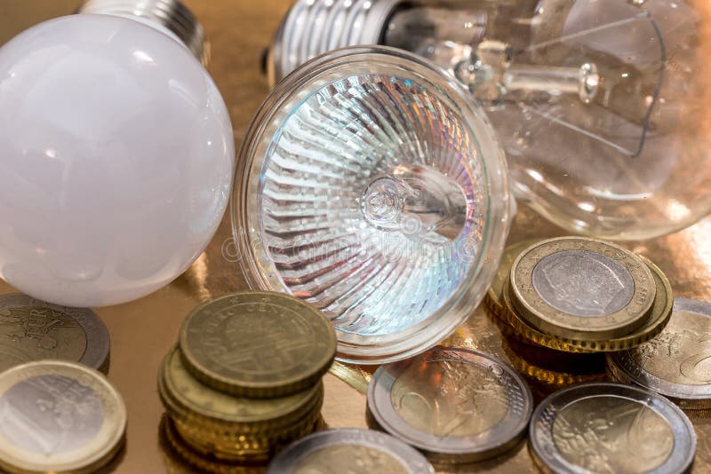 Light bulb with coin. stock photo. Image of coin, close - 128139424