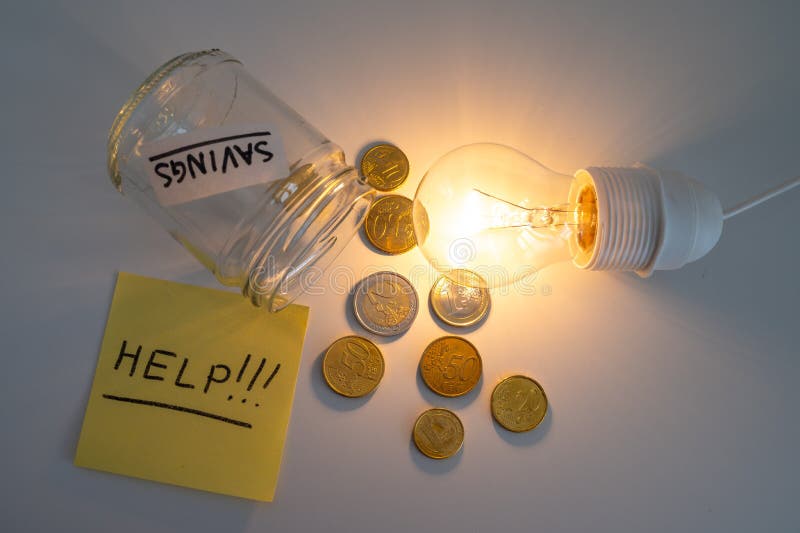 Lit Light Bulb with Coins and Piggy Bank. Increased Bills. Stock Image ...