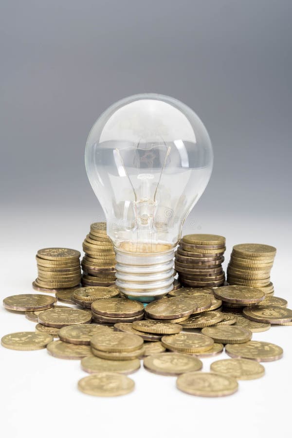 Light Bulb with Coins, Money Ideas Concept Stock Photo - Image of heap ...
