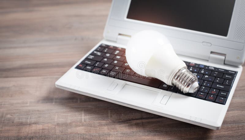 Light Bulb on the Computer Keyboard Stock Photo - Image of plan ...