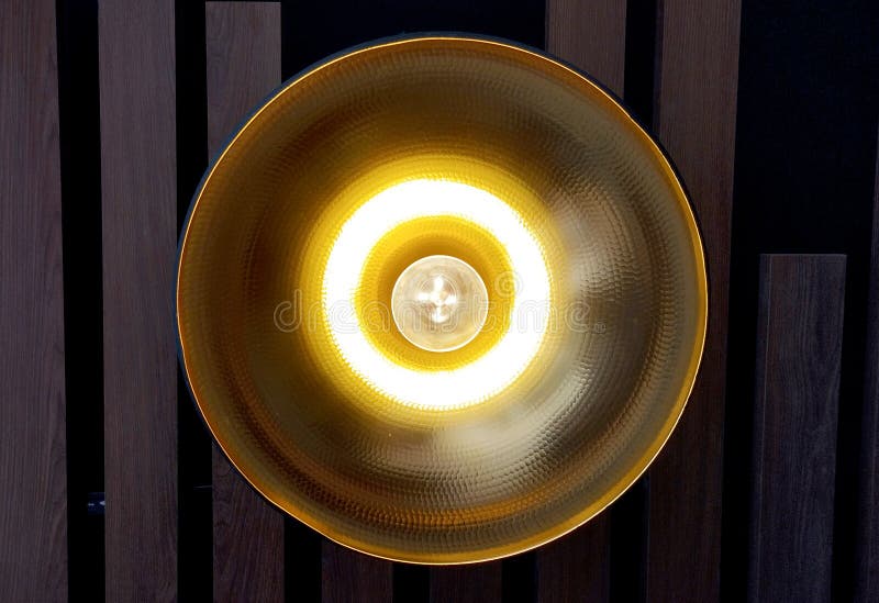 Light Bulb with a Copper Cap in the Shape of a Circle Stock Photo ...