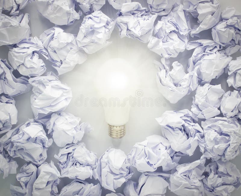 Light Bulb with Crumpled Paper Ball Isolated on White Background.Idea ...