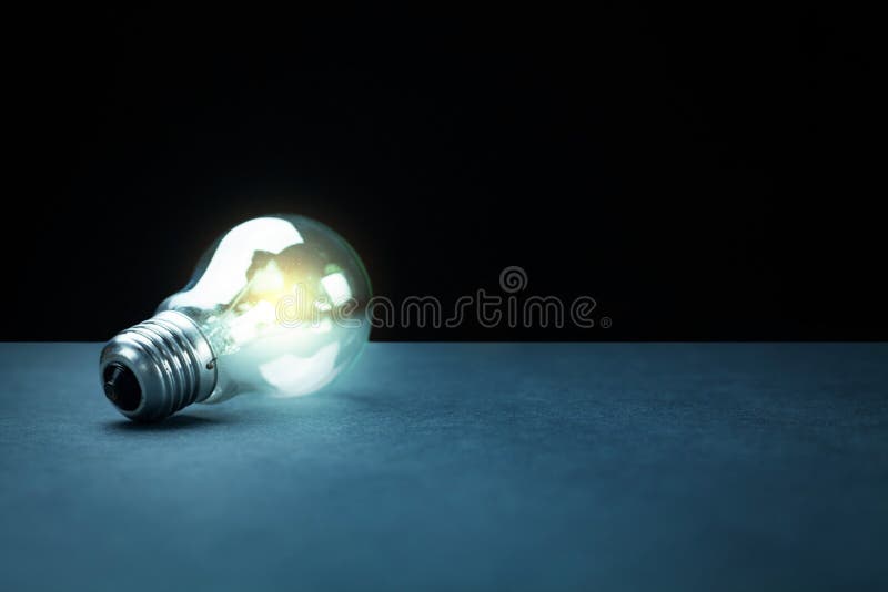 Light Bulb on Dark Background. Stock Photo - Image of concept ...