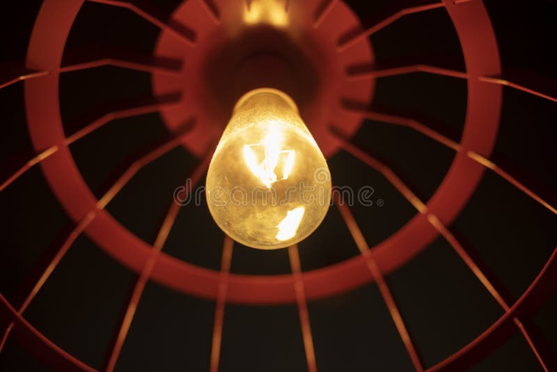 A Light Bulb in the Dark. Element of Light Design Stock Image - Image ...