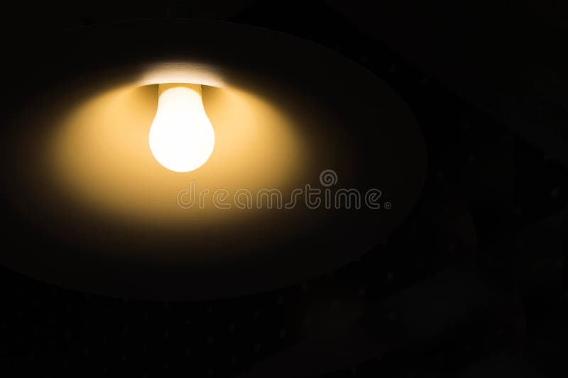 Light Bulb in the Dark, Lighting in Buildings Stock Photo - Image of ...
