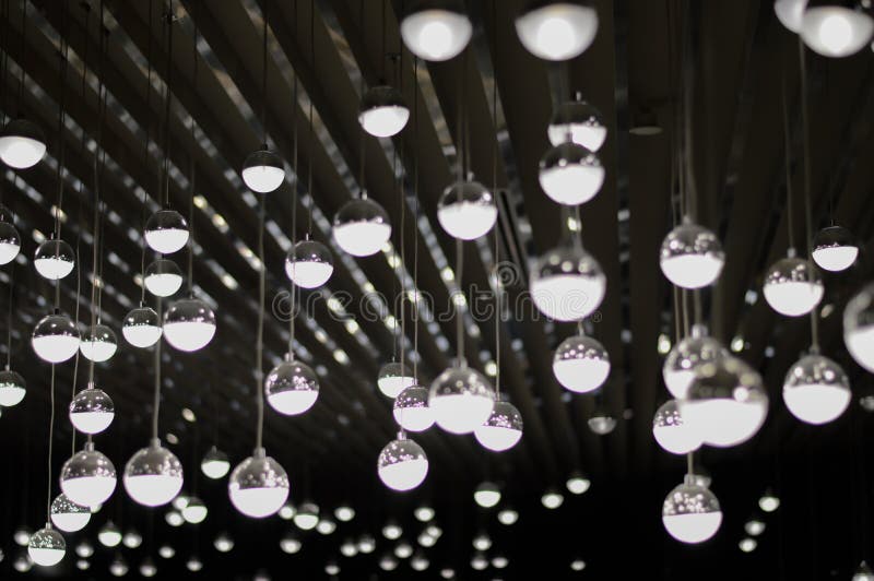 Light bulb in a dark place stock image. Image of antique - 86967345