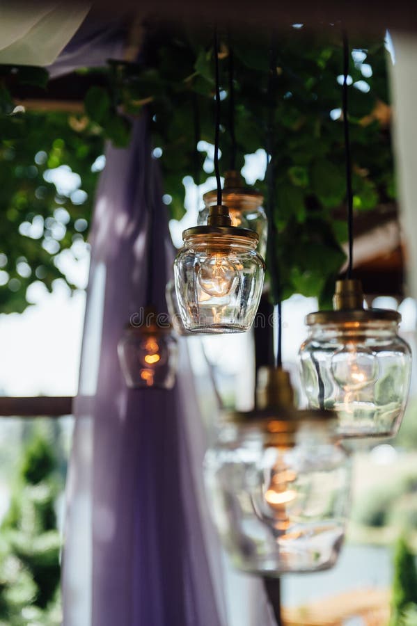 Light Bulb Decor in Outdoor Wedding Ceremony Stock Photo - Image of ...